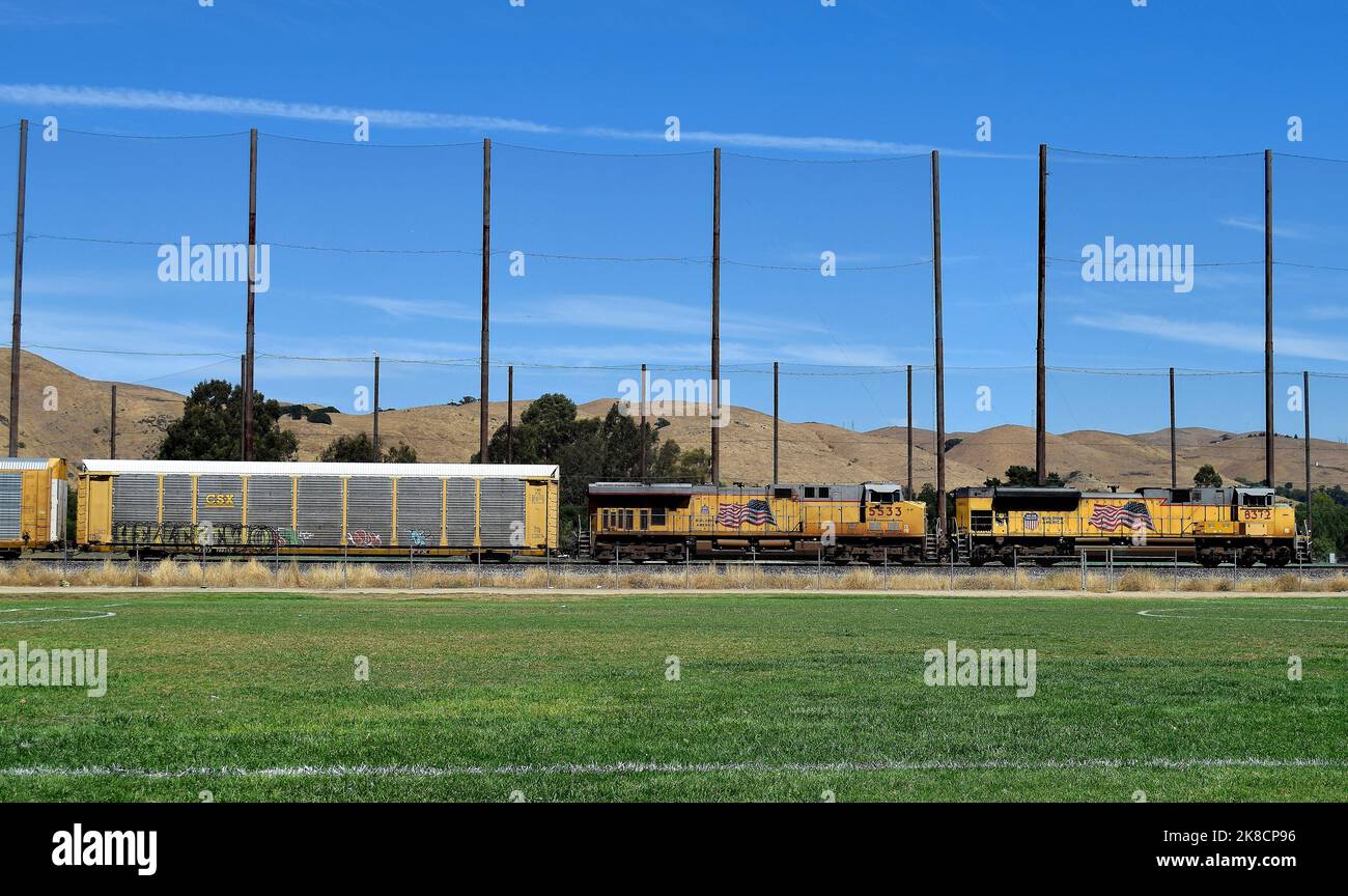 freight train passes a park in Fremont California Stock Photo - Alamy