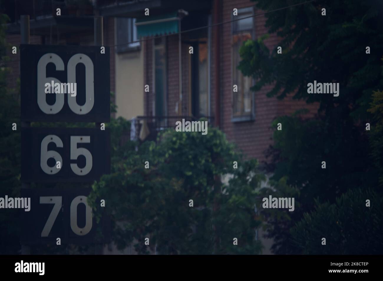 Sign of a railroad track with a facade as background Stock Photo - Alamy