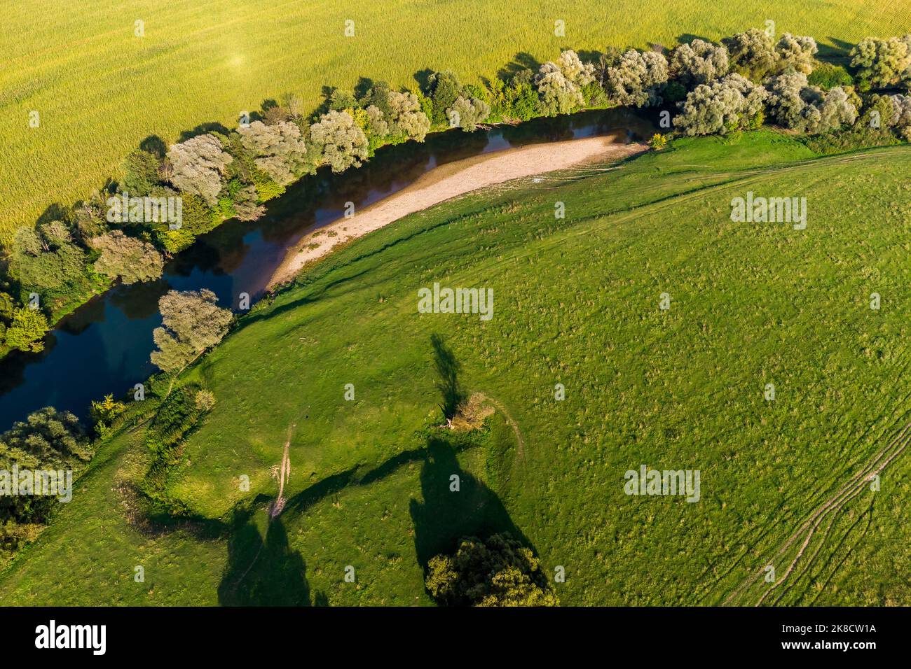 Beautiful green landscape of a river valley with fields and ravines ...