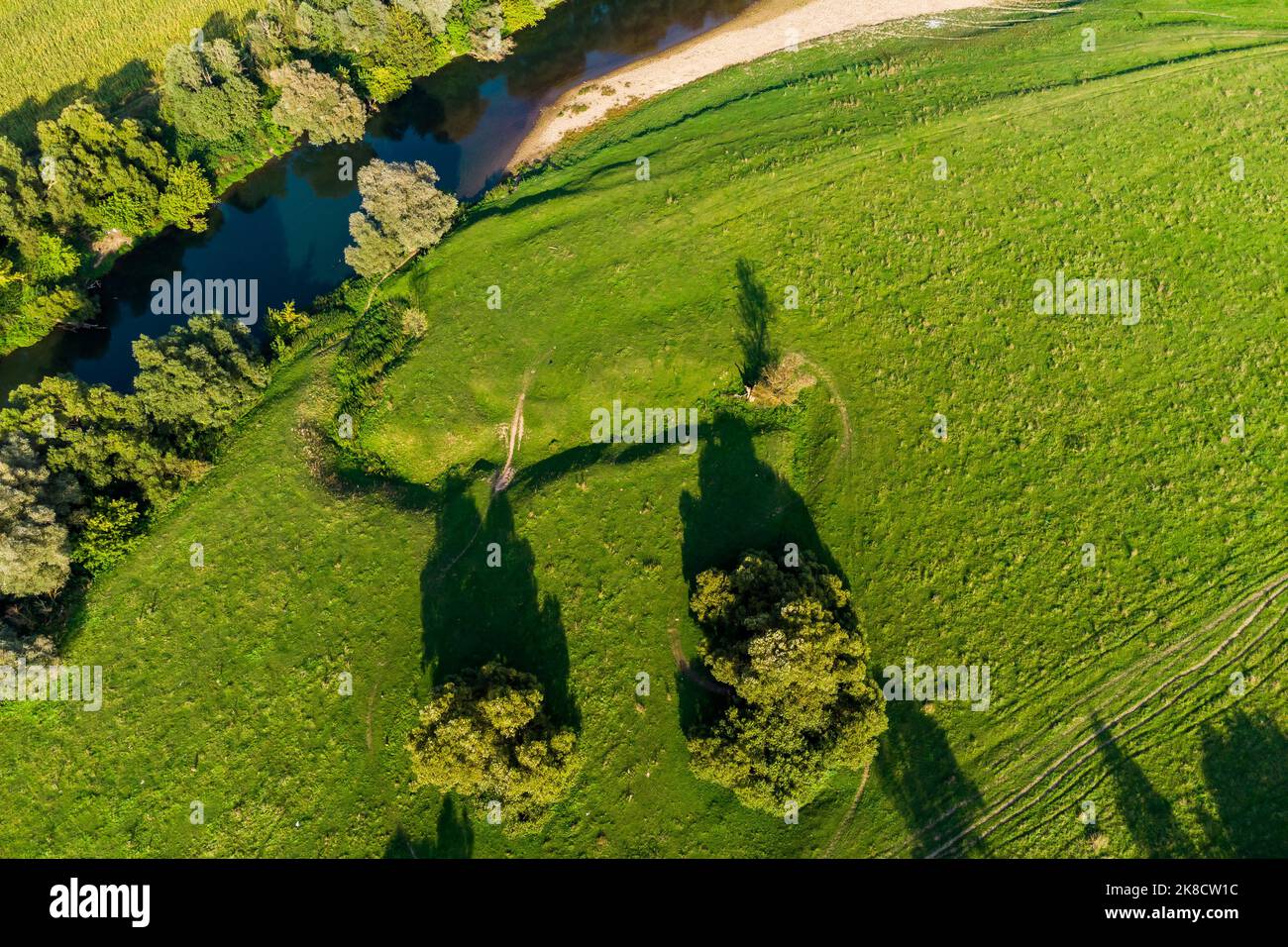 Beautiful green landscape of a river valley with fields and ravines ...