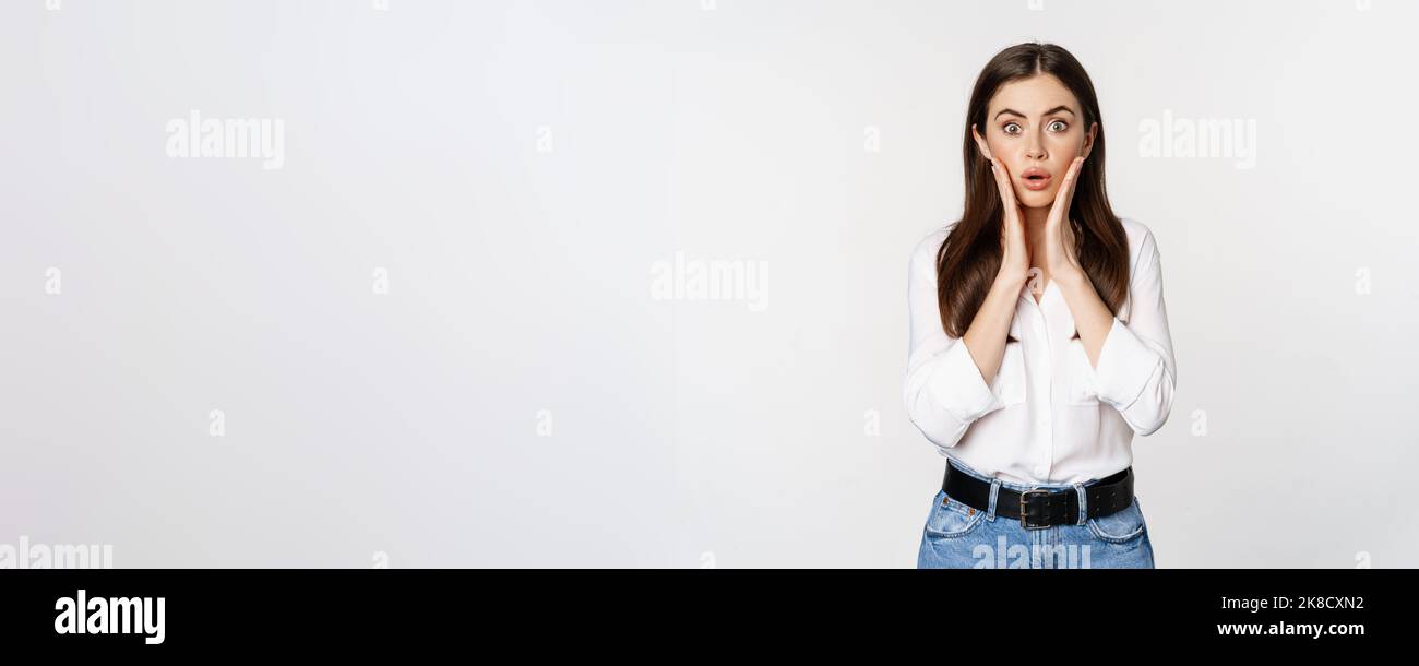 Portrait of concerned female model looking shocked, surprised face ...