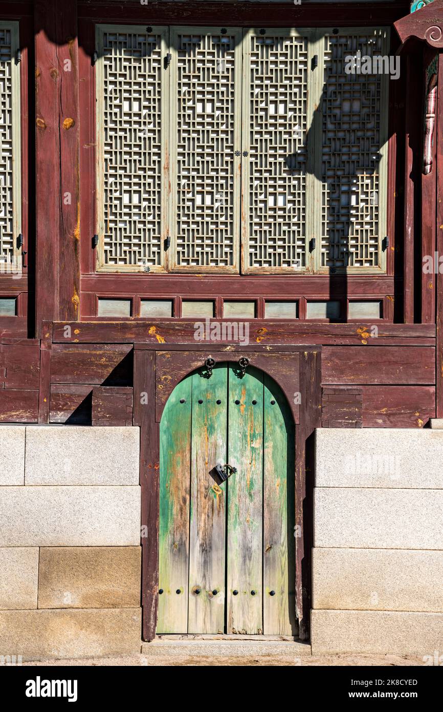 A wooden door and window screen at the Gangnyeong-jeon or Kings ...