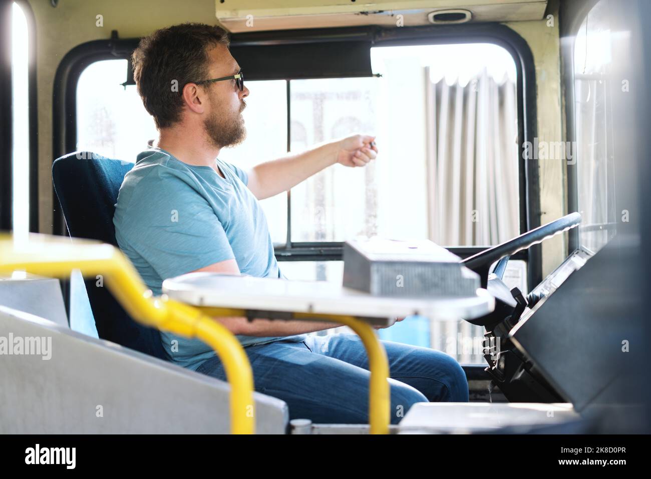 Young man getting bus bus hi-res stock photography and images - Alamy