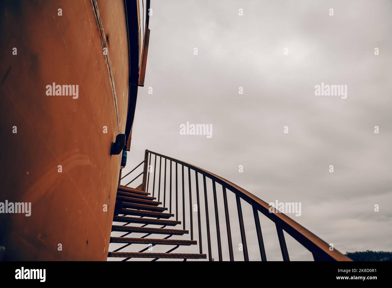 Picture of rusty tower with stairs on construction site Stock Photo - Alamy