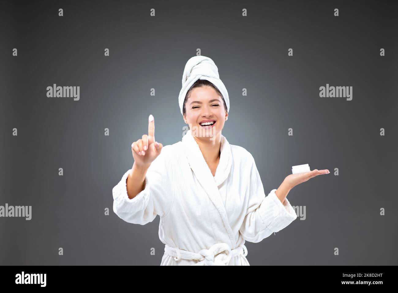 Applying Creams And Masks For Face Skincare A Smiling And Excited Cute