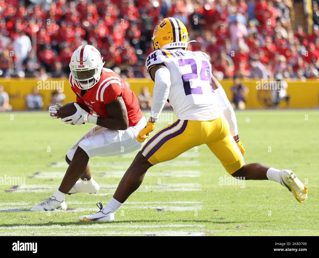 Ole Miss wide receiver Jonathan Mingo (1) tries to make a move on LSU ...