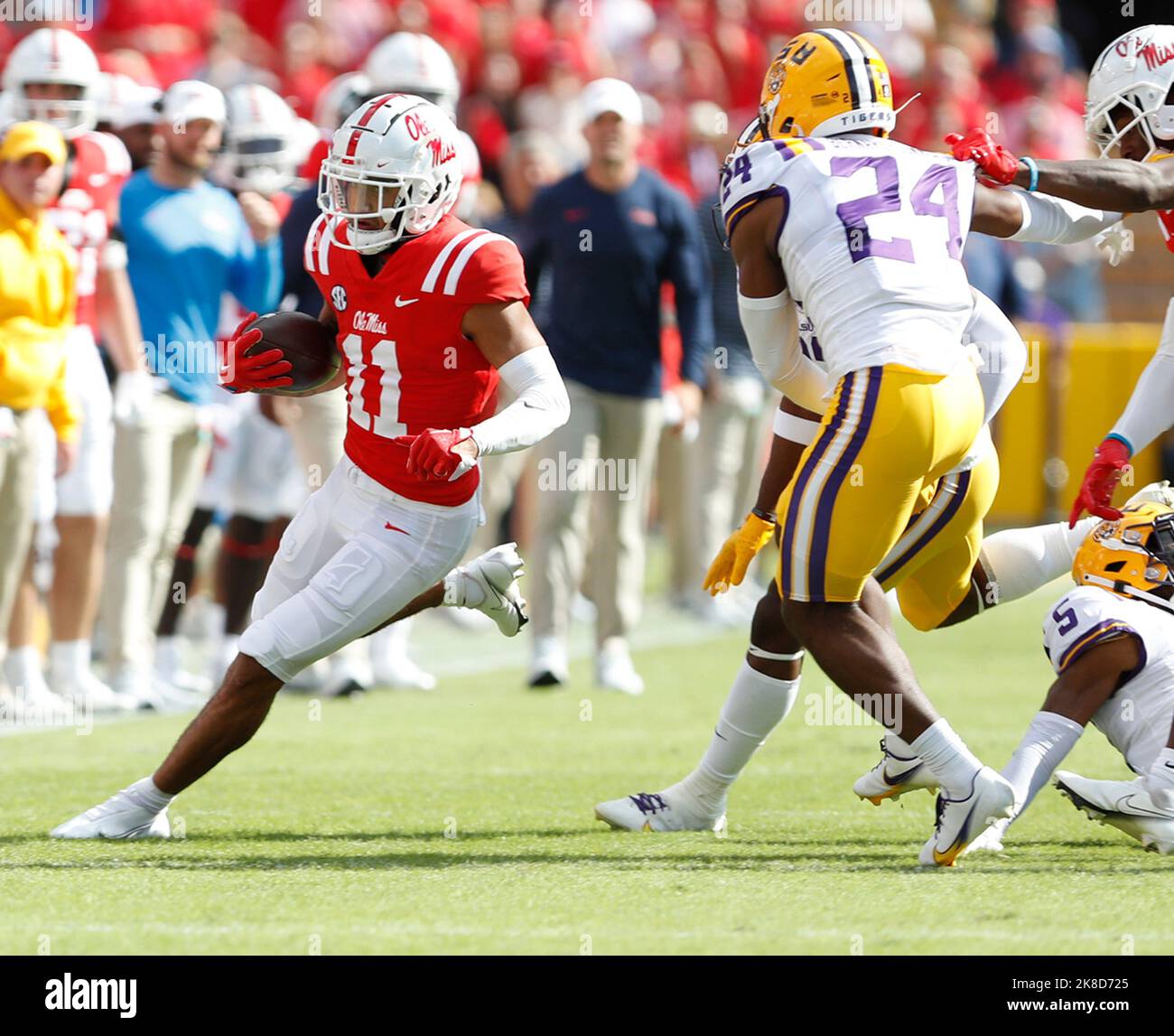 Ole Miss wide receiver Jordan Watkins (11) tries to get past LSU Tigers ...