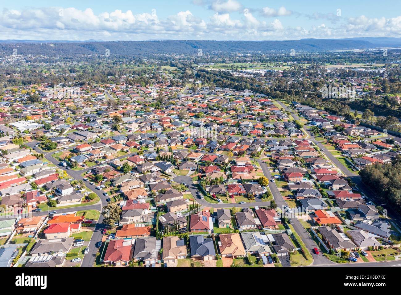 Drone aerial photograph of houses and roads in the suburb of Glenmore ...
