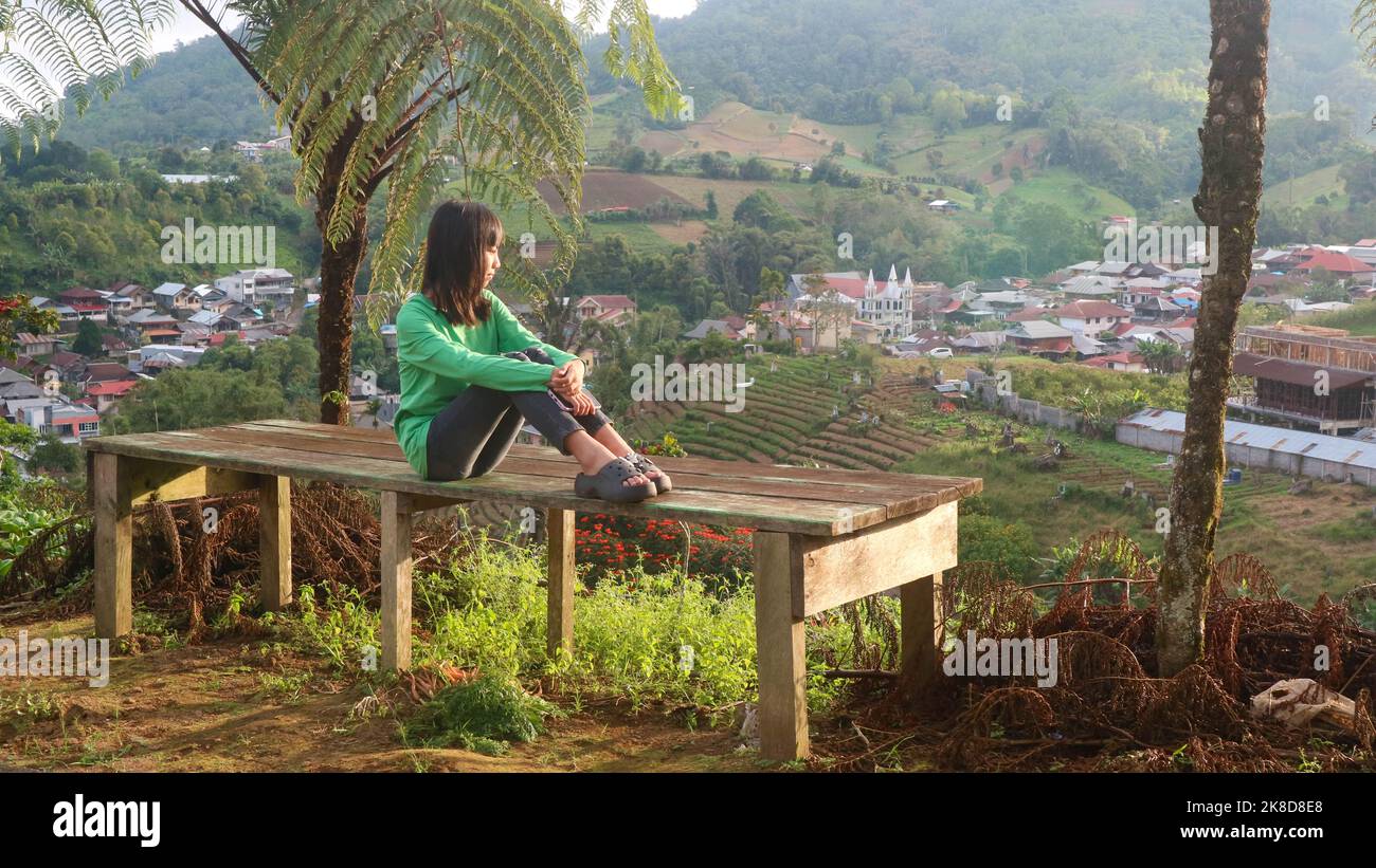 A beautiful little girl at the top of the rurukan Stock Photo - Alamy