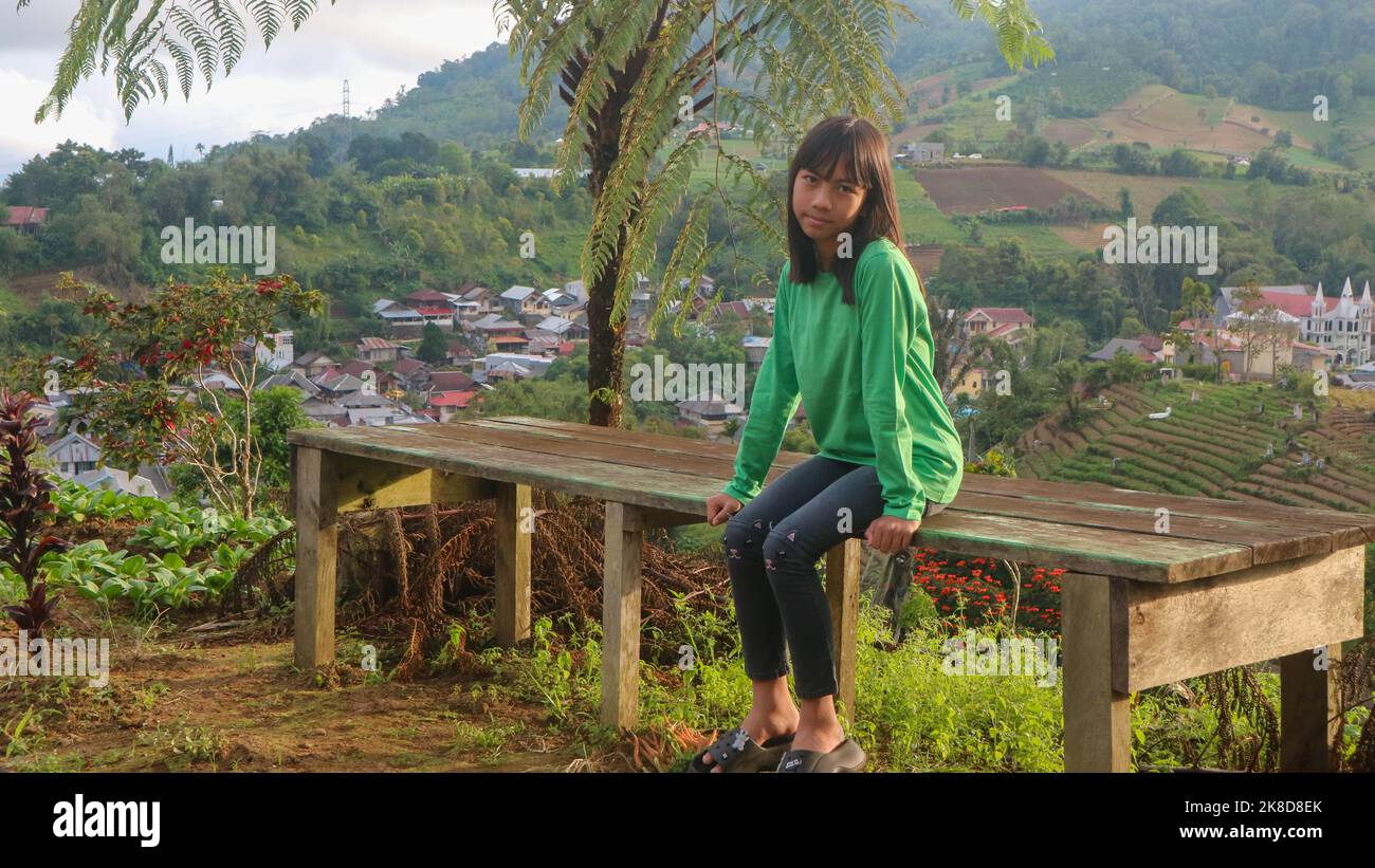 A beautiful little girl at the top of the rurukan Stock Photo - Alamy