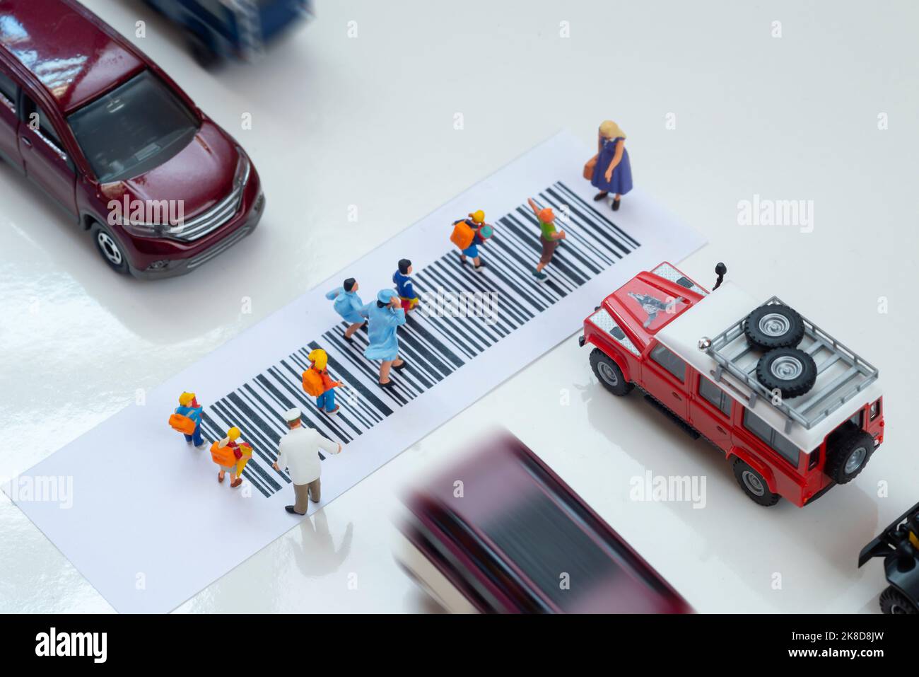 Miniature toys school kids walk on cross road bar code - school ...