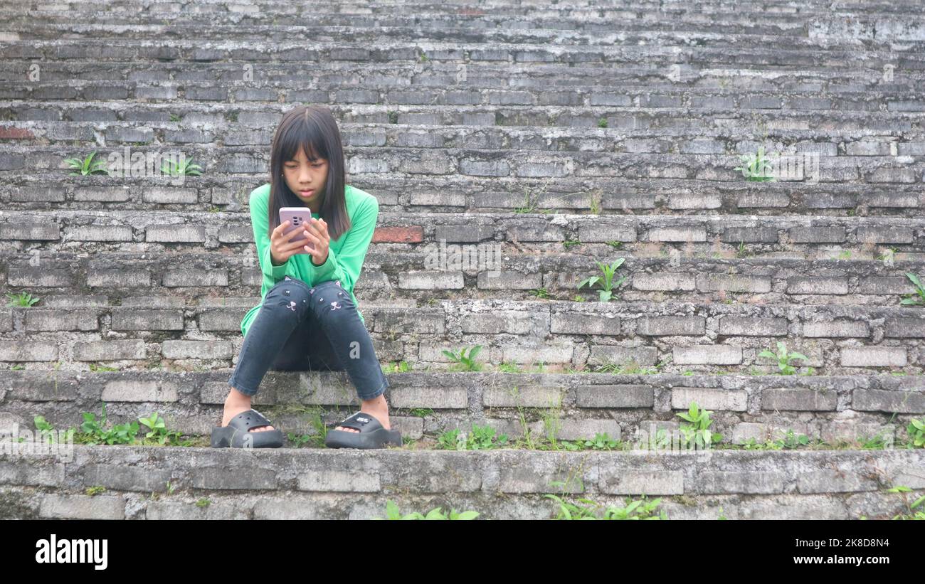 A beautiful little girl at the top of the rurukan Stock Photo - Alamy