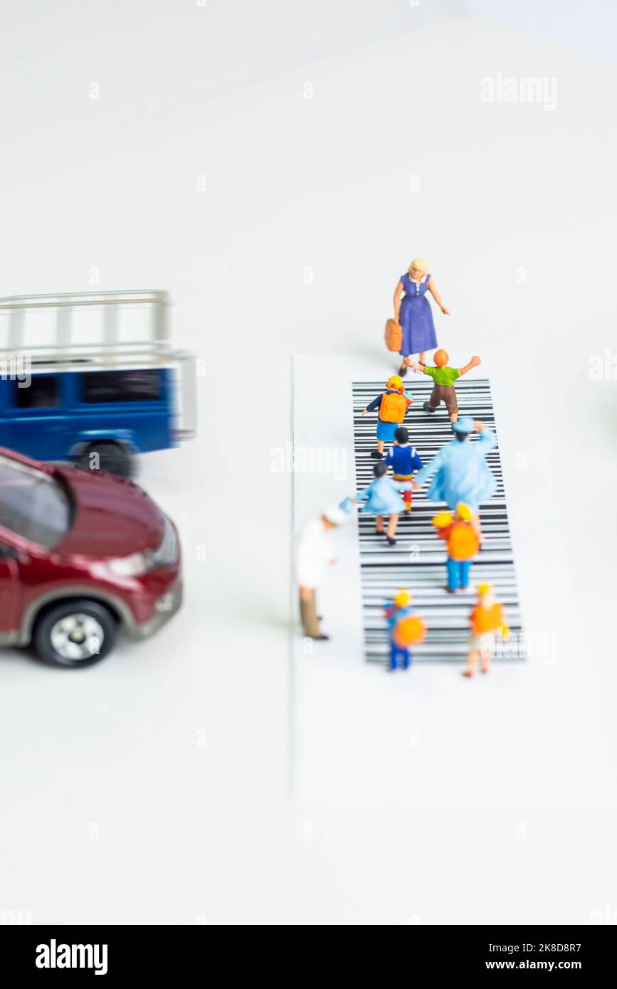 Miniature toys school kids walk on cross road bar code - school ...