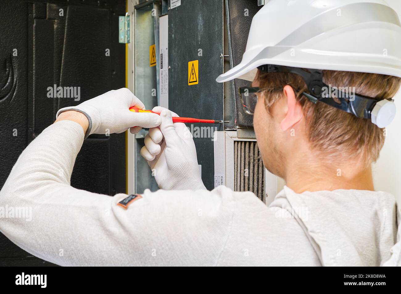 hvac filter replacement home central air system. servicemen changing ...