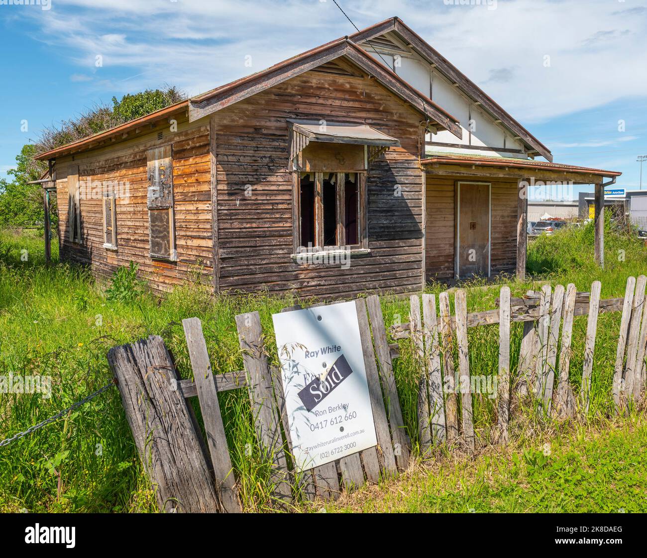 Dilapidated house in Inverell with sold sign out the front, shows that ...