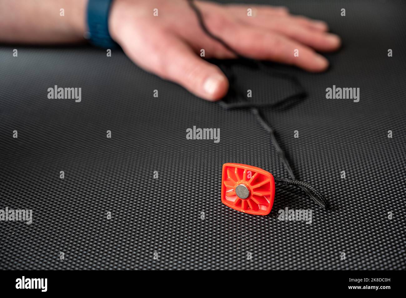 Focus on exercise equipment emergency stop laying on a treadmill belt ...