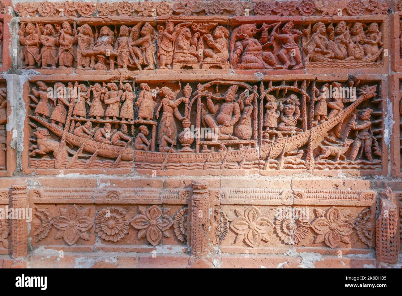 Detail of boat with noble man smoking hookah terracotta carving at ...