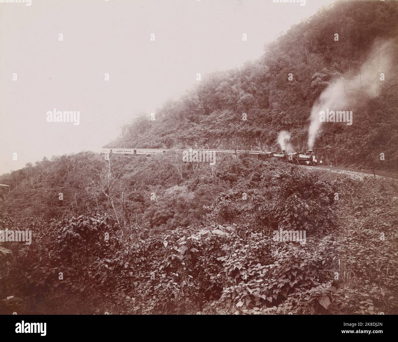 Vintage black and white photograph of a Mexican passenger train pulled ...