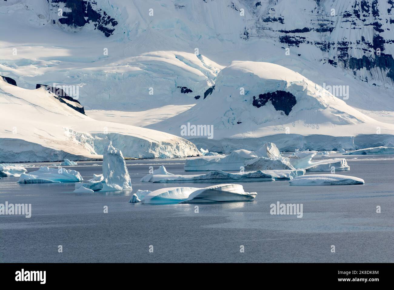 icebergs in gerlache strait near entrance to neumayer channel. with ...