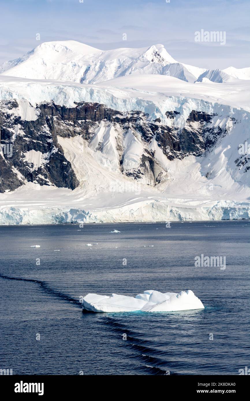 cruise ship wake and iceberg in gerlache strait near entrance to ...