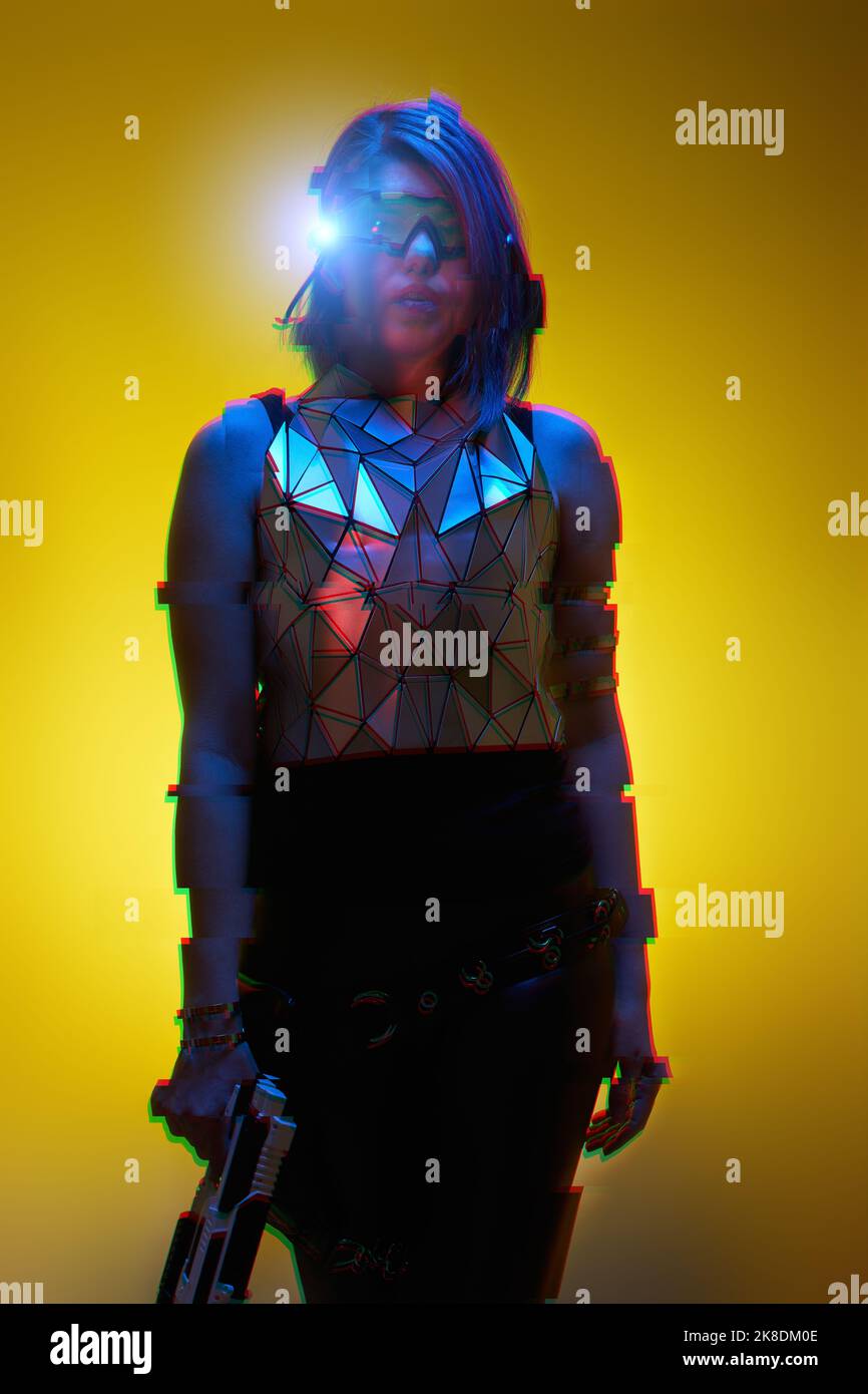Girl with blaster in the futuristic battle. Concept virtual reality ...