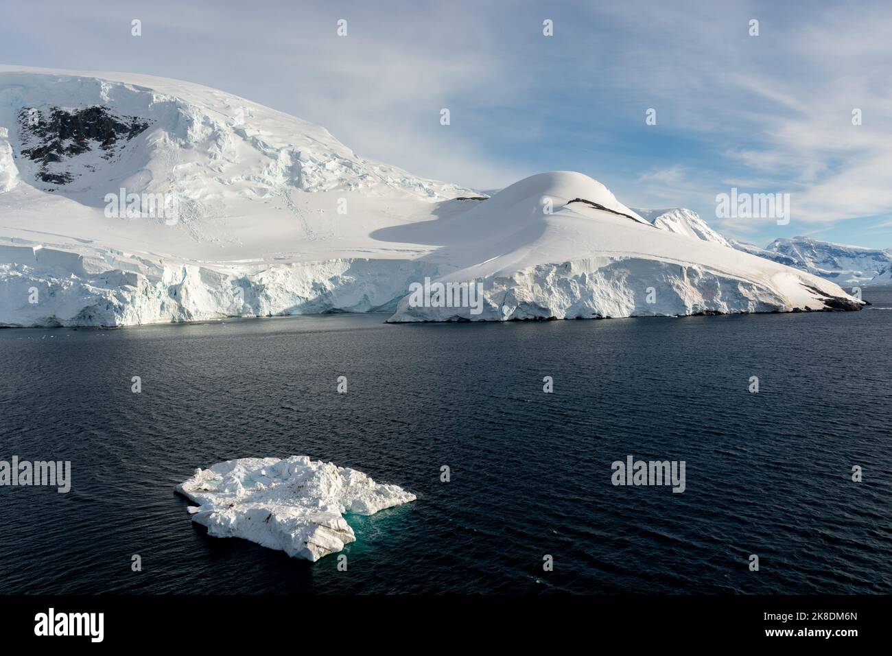 small iceberg in waters of neumayer channel. with smooth dome shaped ...