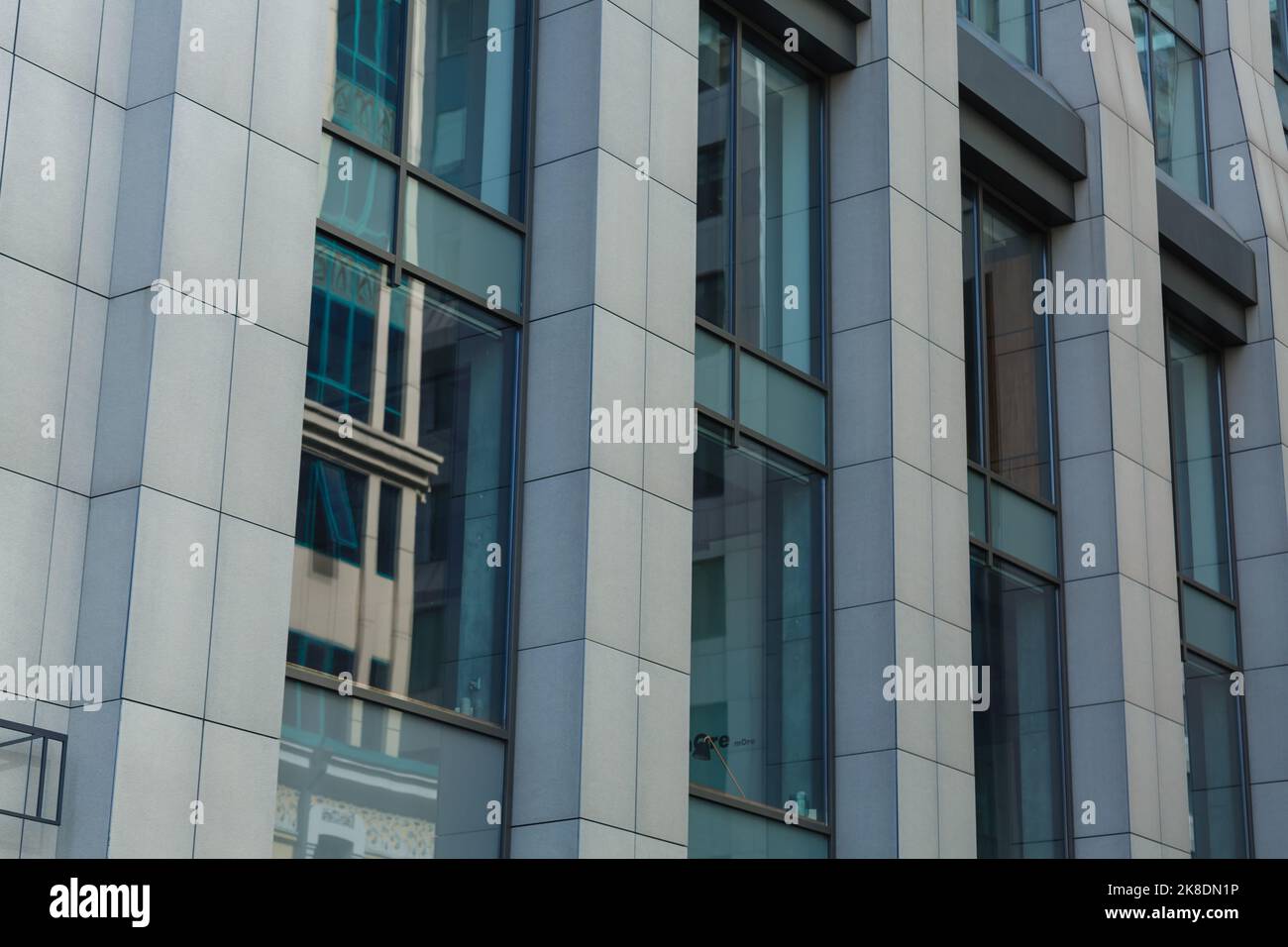 Urban gray Office Building With Windows Stock Photo - Alamy