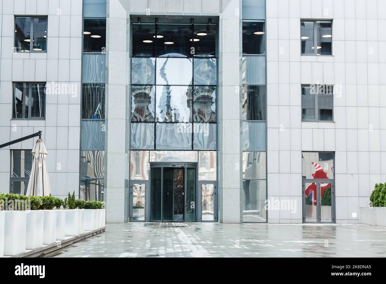 Urban gray Office Building With Windows Stock Photo - Alamy
