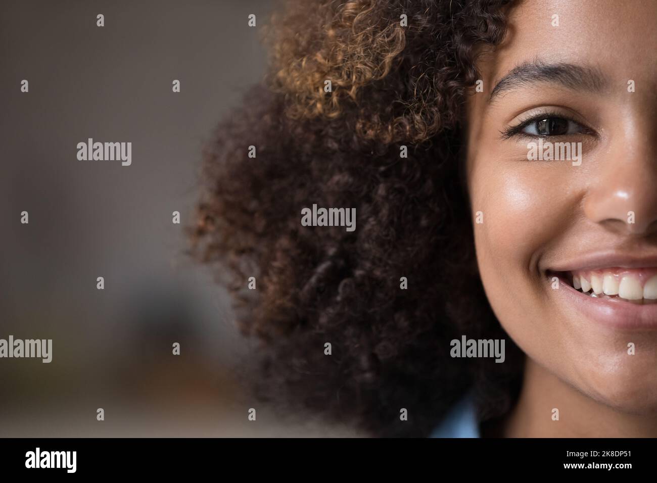 Closeup cropped front half face view of beautiful African girl Stock ...