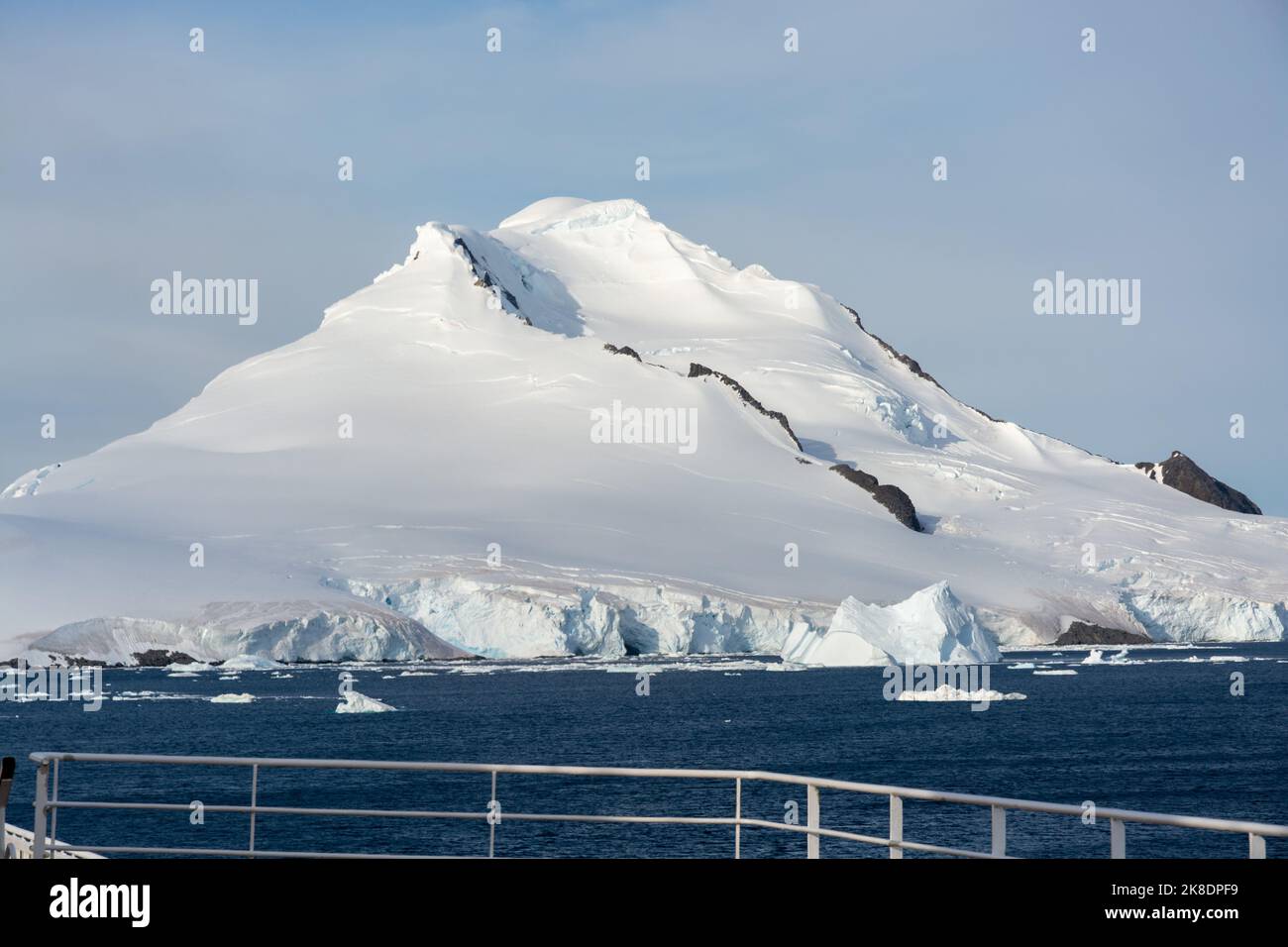 ice and snow covered peaks and shores of anvers island from neumayer ...