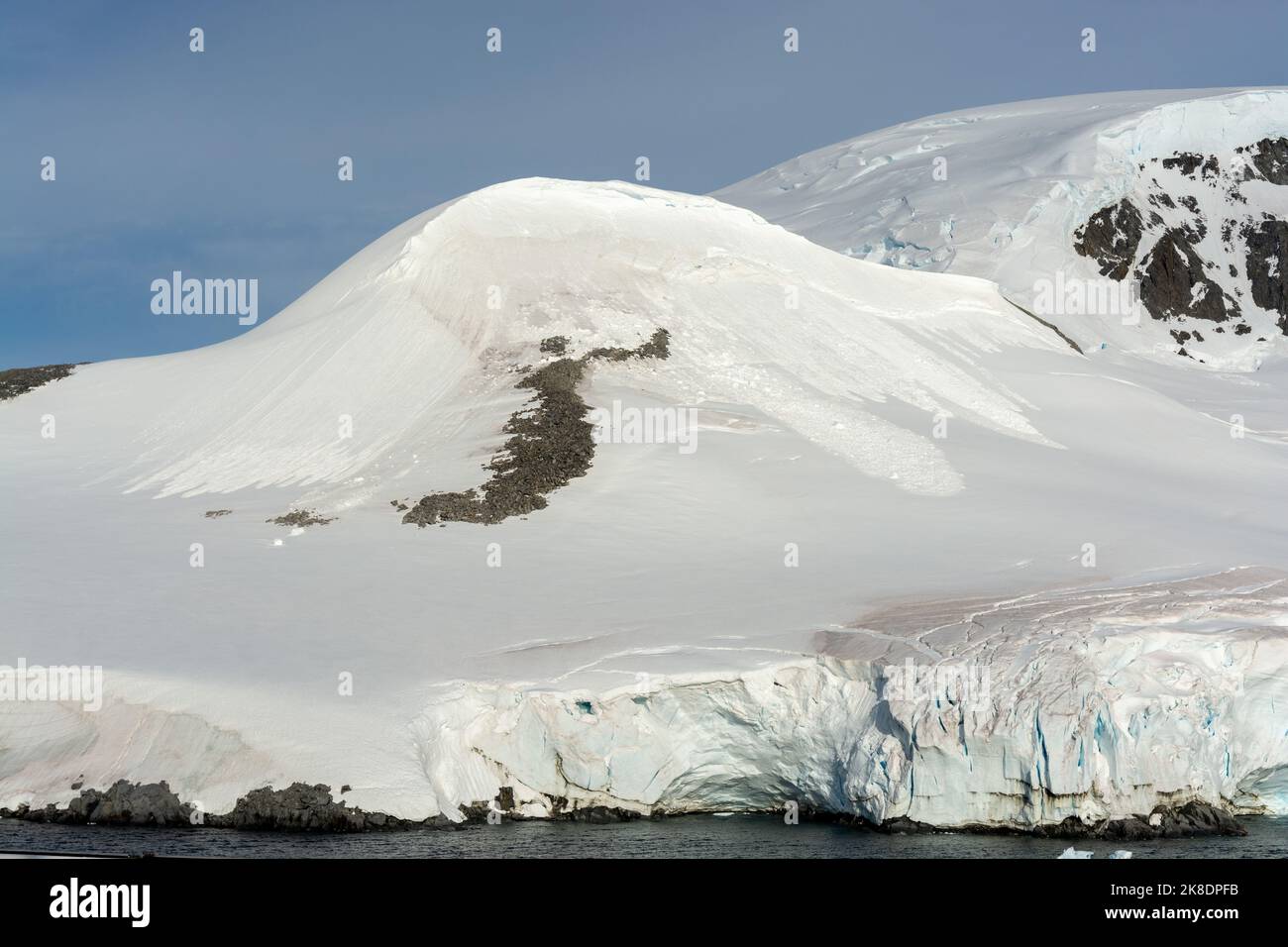 ice and snow covered shores of anvers island from neumayer channel ...