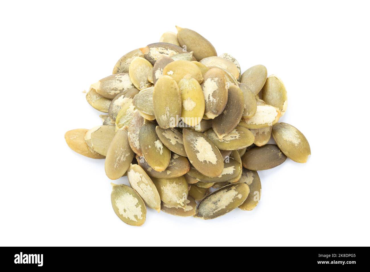 Pumpkin seeds on white background. Green pepita seeds. Top view Stock ...