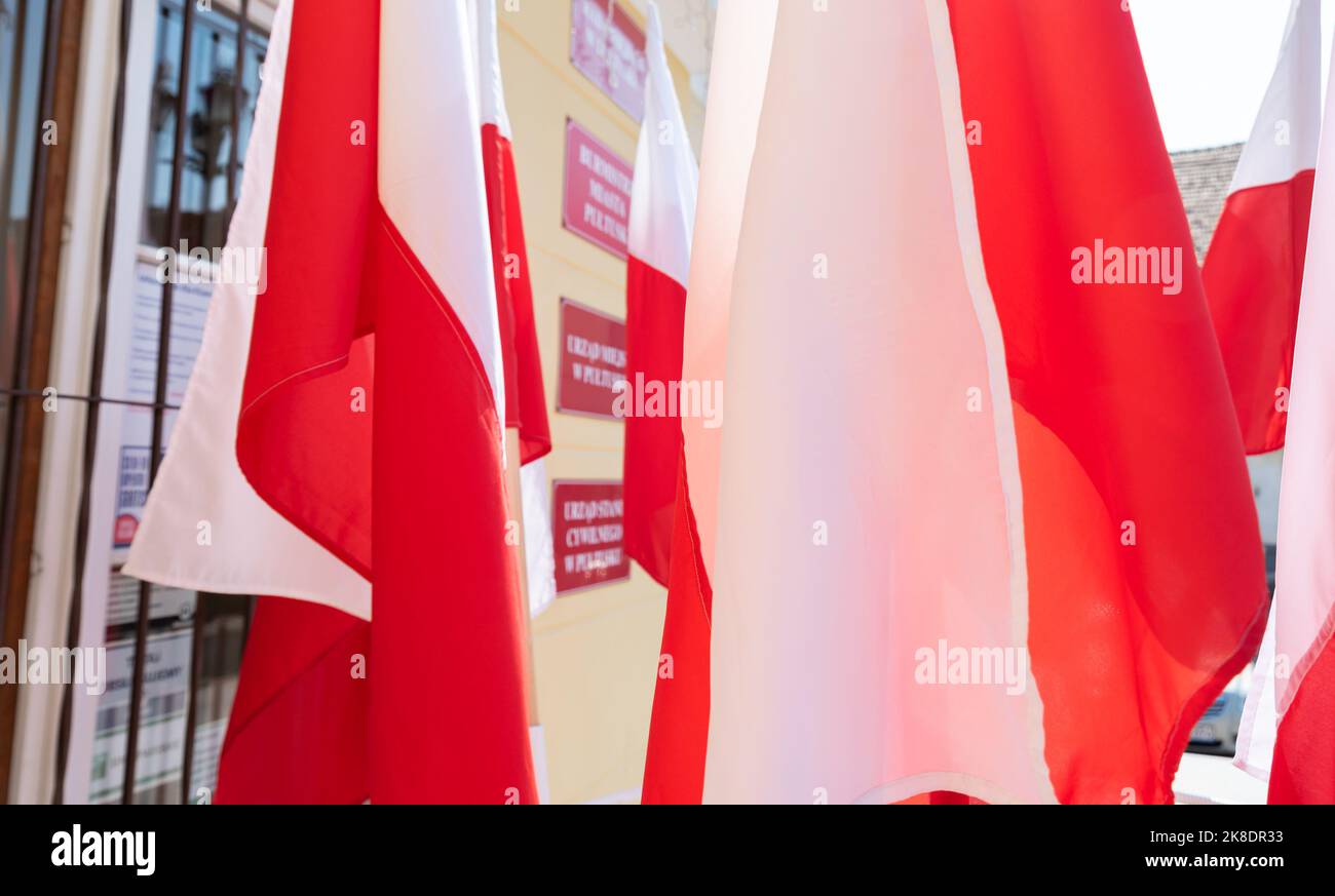Red and white flags set close together. Symbol and Polish national ...
