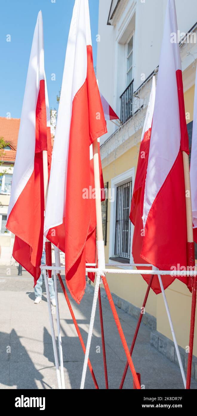 Red and white flags set close together. Symbol and Polish national ...