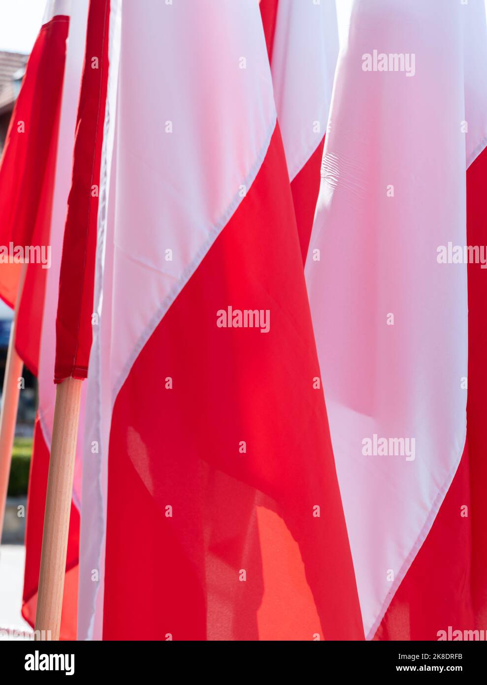 Red and white flags set close together. Symbol and Polish national ...