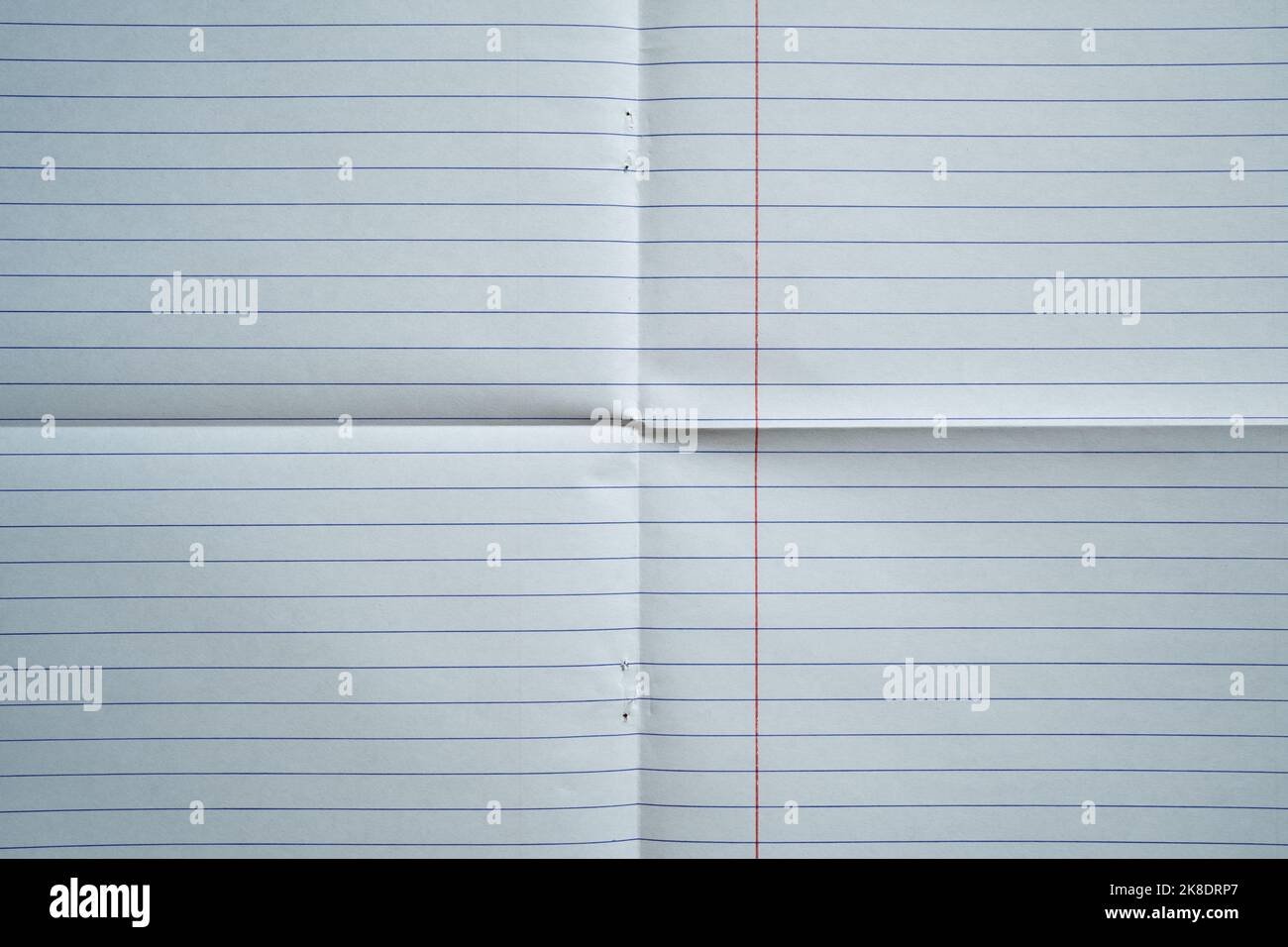 Lined white paper folded in four fraction background Stock Photo - Alamy