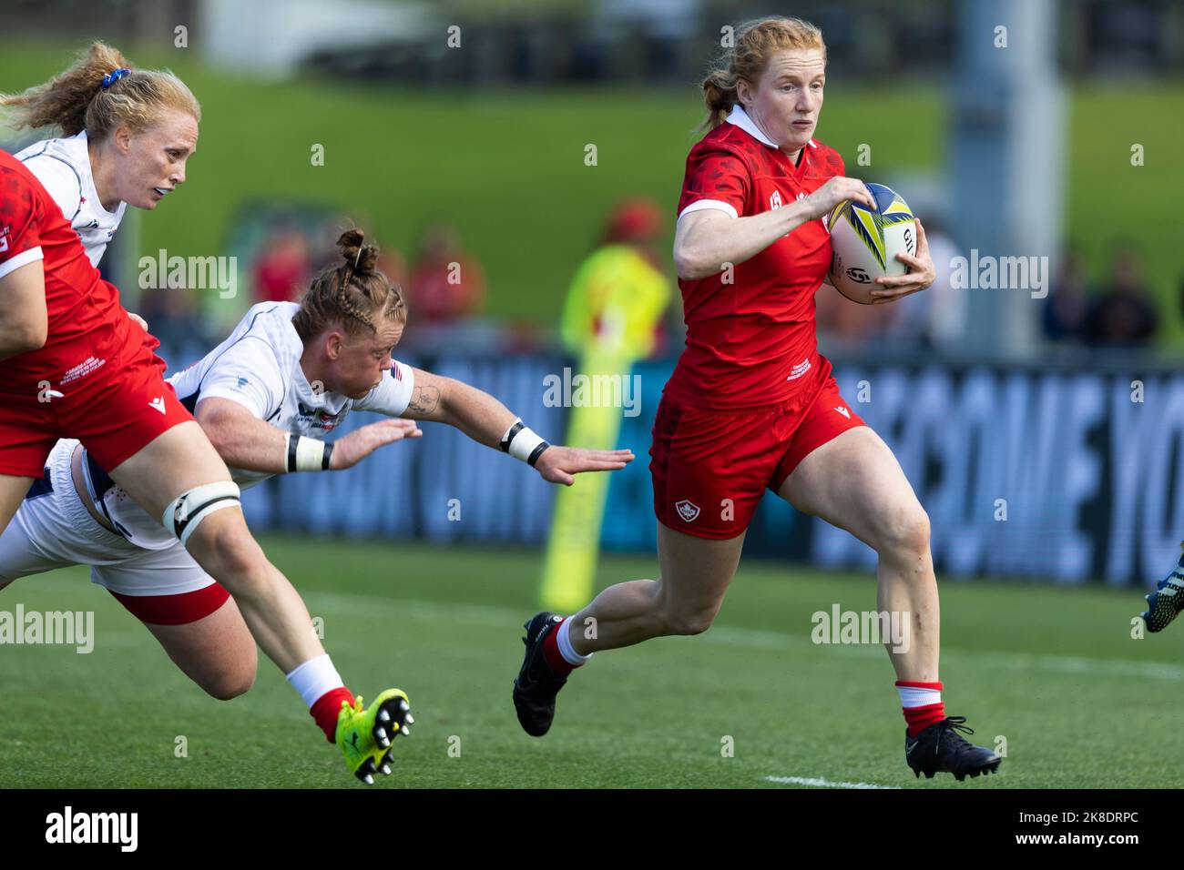 Canada's Paige Farries runs in a try during the Women's Rugby World Cup ...