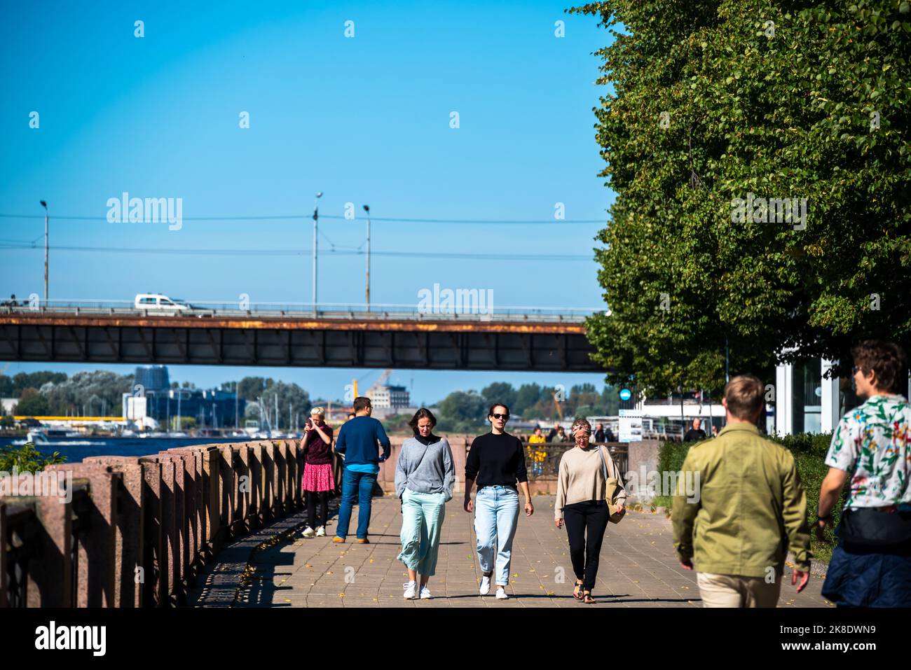 Riga, Latvia - 09 10 2022: People Walk Along The Promenade Along The ...