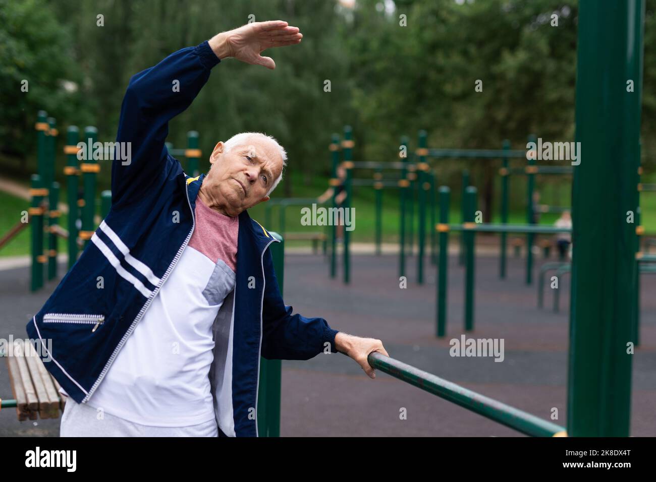Elderly man doing physical exercises hi-res stock photography and ...