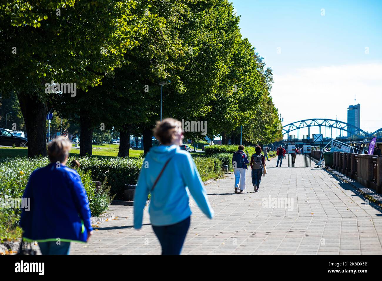 Riga, Latvia - 09 10 2022: People Walk Along The Promenade Along The ...