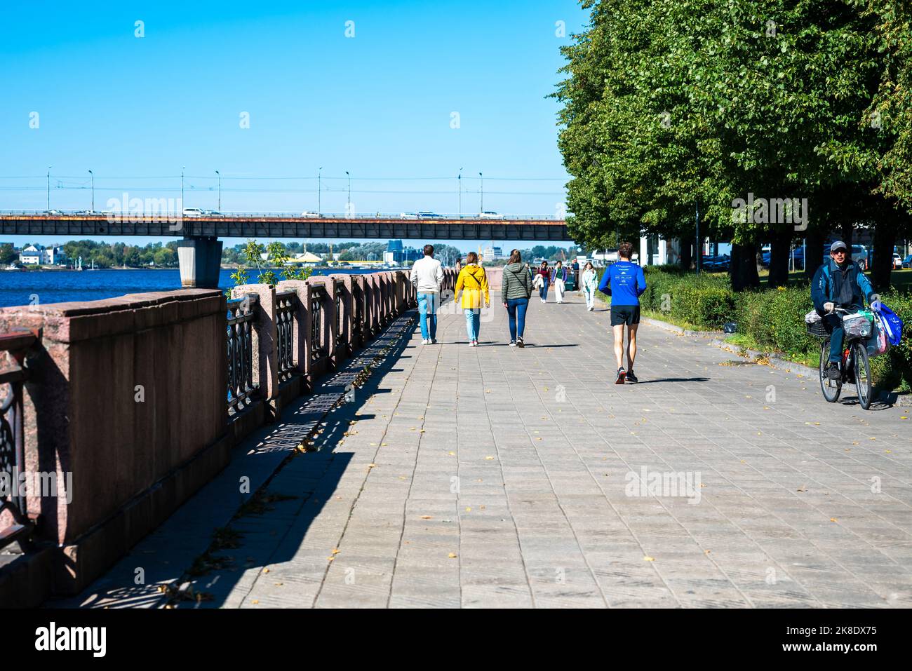 Riga, Latvia - 09 10 2022: People Walk Along The Promenade Along The ...