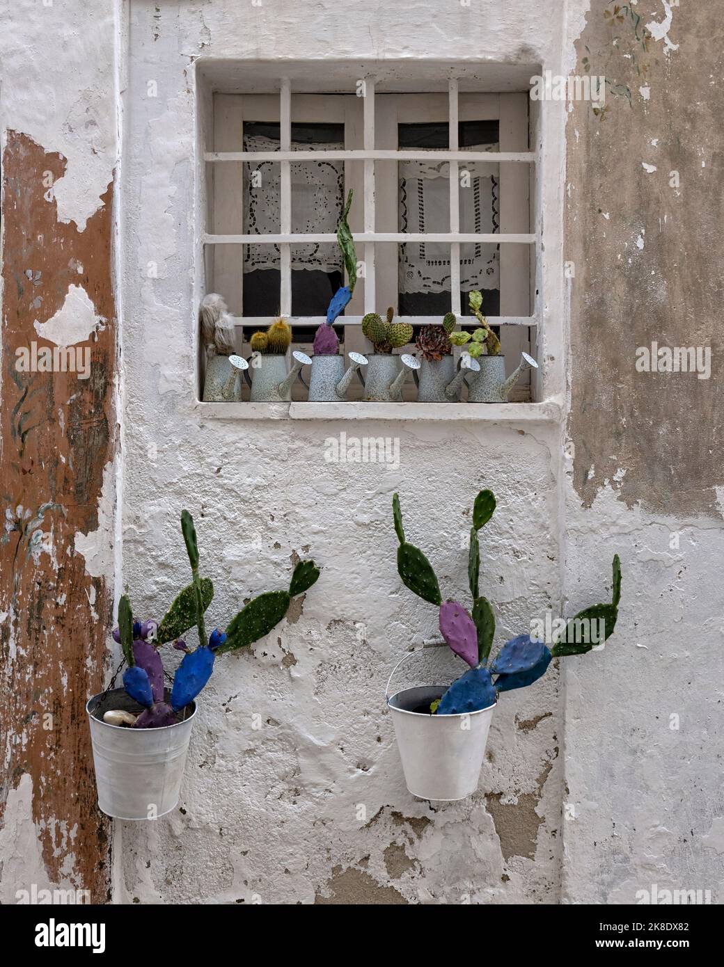 LOCOROTONDO, ITALY - OCTOBER 13, 2019: Pretty window in the old town ...