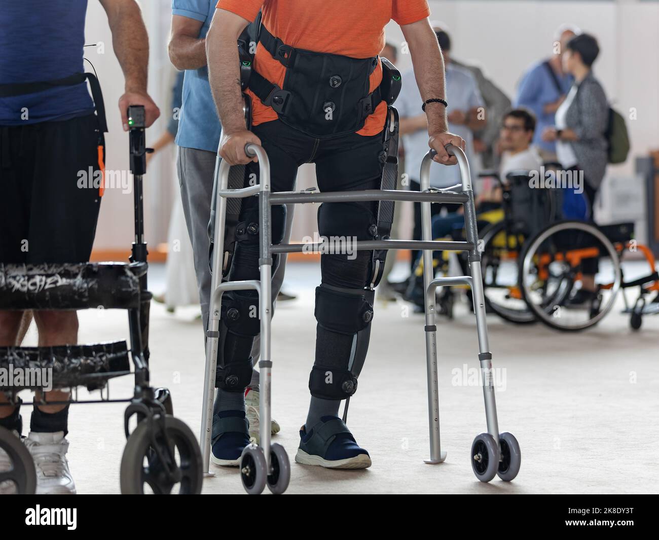 Boy with Mobility Problems in Lower Limbs in Upright Posture Walking ...