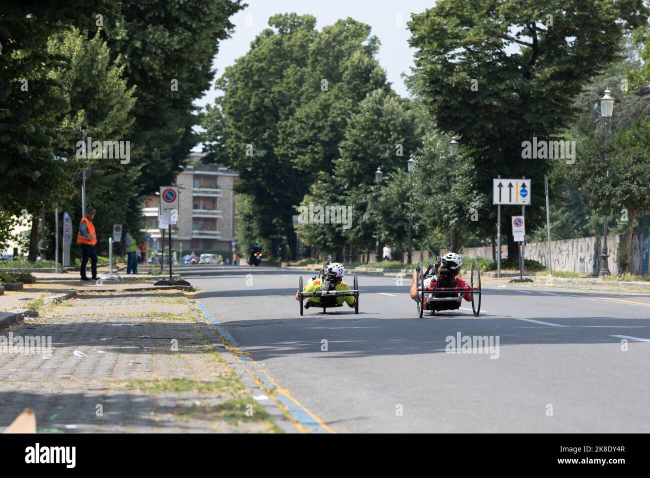 Couple of Athletes training with Their Special Bikes on a City Track ...