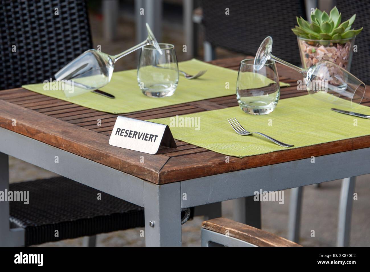 Restaurant reserved table sign with wine glasses ready for a party ...