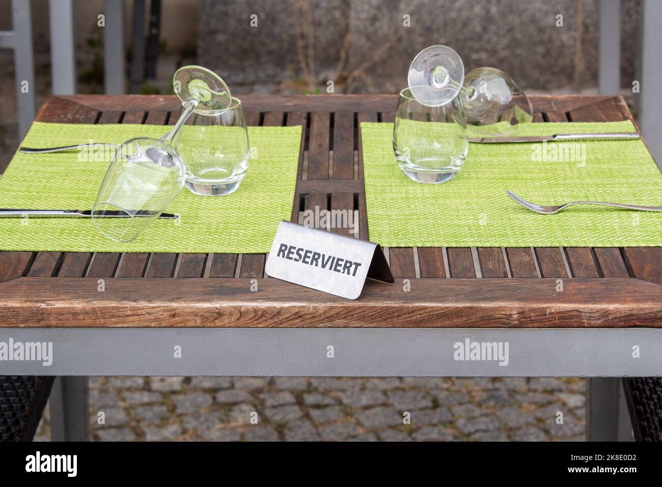Restaurant reserved table sign with wine glasses ready for a party ...
