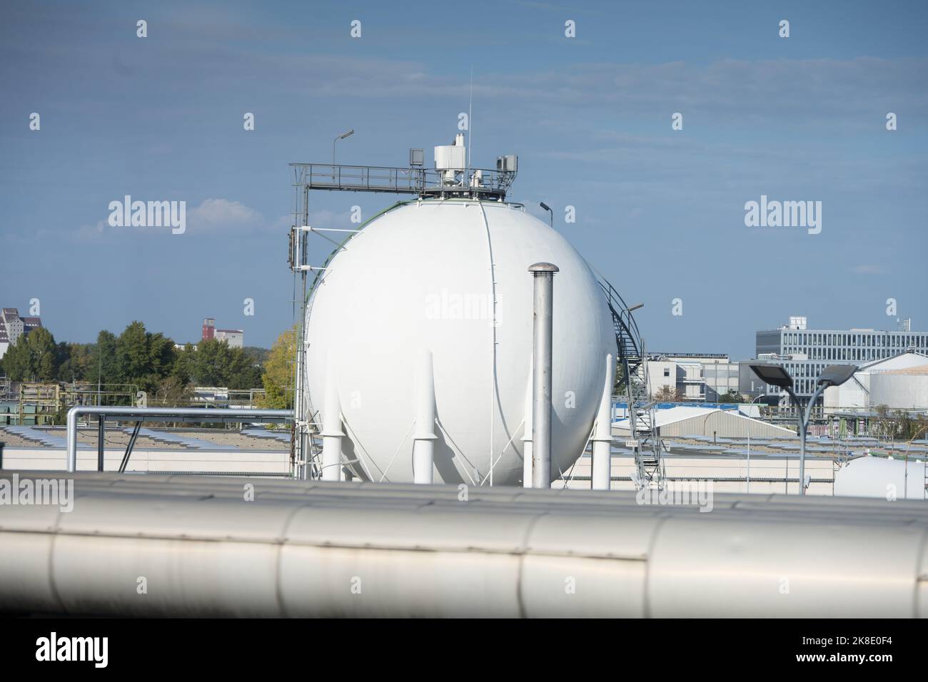 Round large storage tank of a modern oil refinery as a concept for ...