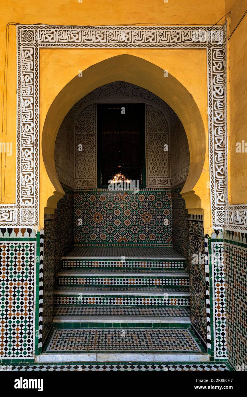 Prayer niche in yellow wall, coloured tile mosaics, mihrab in the ...
