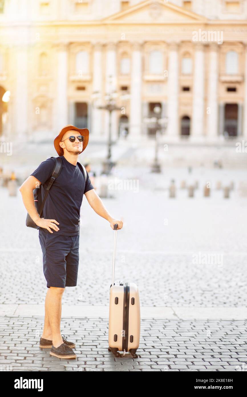 young man tourist in Rome at Vatican city on vacation, an emigrant ...