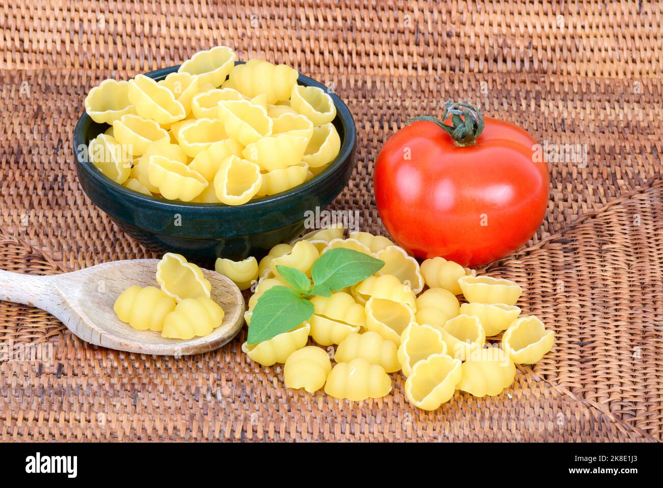 Italian pasta, gnocchi, pasta, noodles, tomato, basil Stock Photo - Alamy